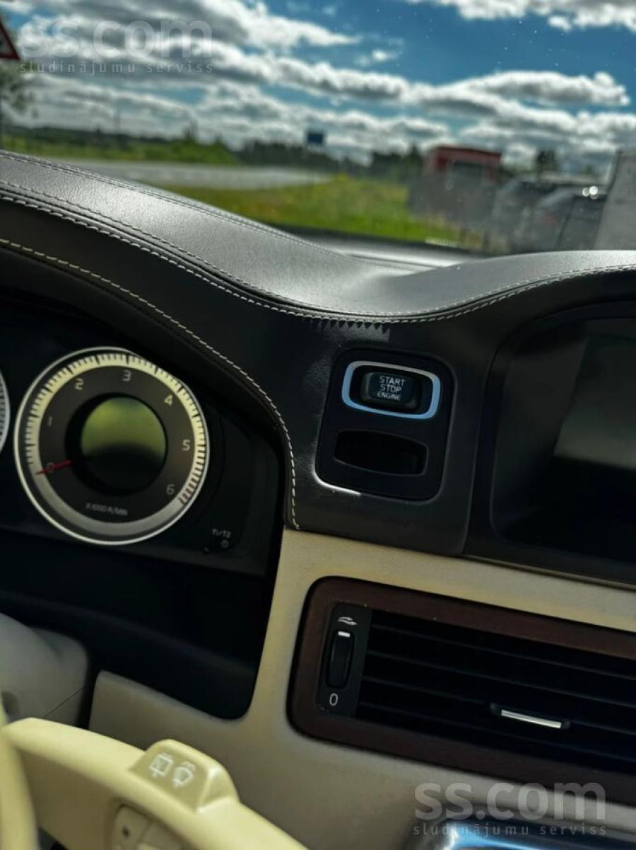 Zils Volvo V70 2012 Cēsis, ar dzinēja tilpumu 2.40 L un nobraukumu 425 tūkst. km par 5300 €, foto 12 vietnē AUTOMOTO.COM.LV