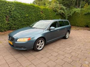 Zils Volvo V70 2012 Kauņa, ar dzinēja tilpumu 2.40 L un nobraukumu 312 tūkst. km par 5700 €, foto  vietnē AUTOMOTO.COM.LV