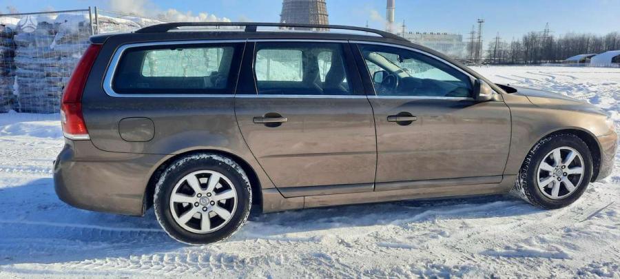 Brown Volvo V70 2014 in Kaunas, with an engine capacity of 1.56 L and mileage of 254 thousand km for 5290 €, photo 9 on AUTOMOTO.COM.LV