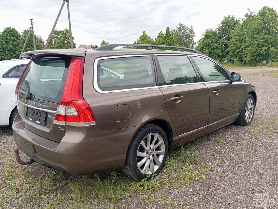 Brown Volvo V70 2014 in Sakiai, with an engine capacity of 2.00 L and mileage of 331 thousand km for 6300 €, photo 5 on AUTOMOTO.COM.LV