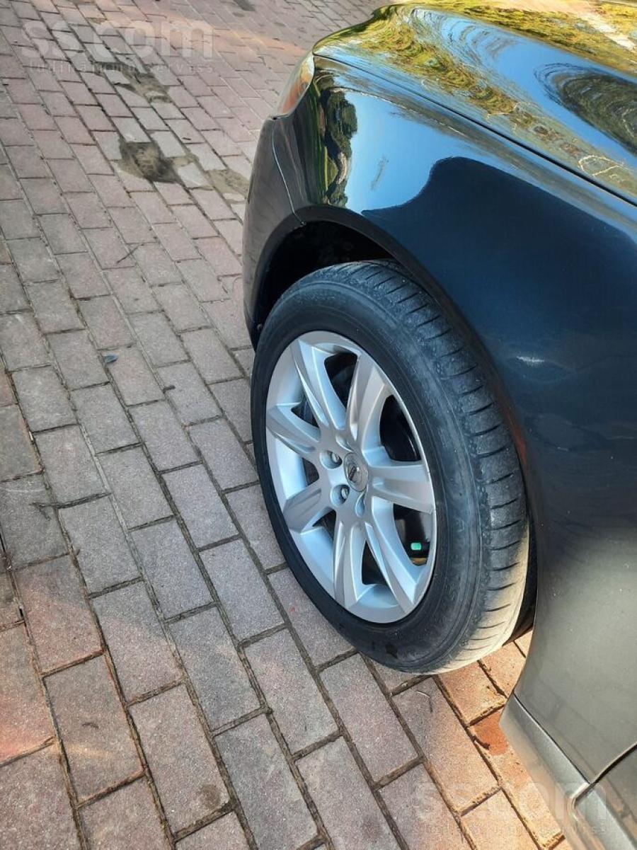 Grey Volvo V70 2012 in Ogre, with an engine capacity of 2.00 L and mileage of 300 thousand km for 5880 €, photo 13 on AUTOMOTO.COM.LV
