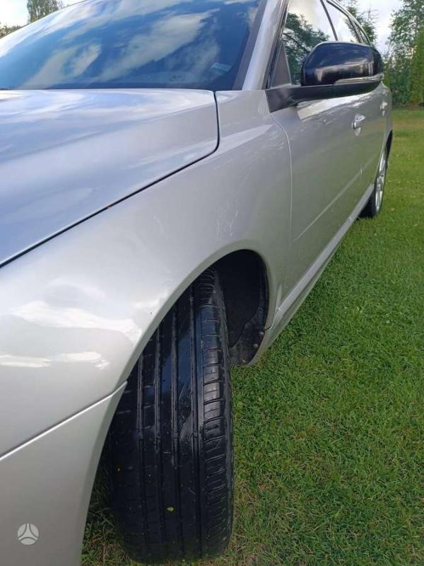Grey Volvo V70 2015 in Varena, with an engine capacity of 1.98 L and mileage of 310 thousand km for 7150 €, photo 9 on AUTOMOTO.COM.LV