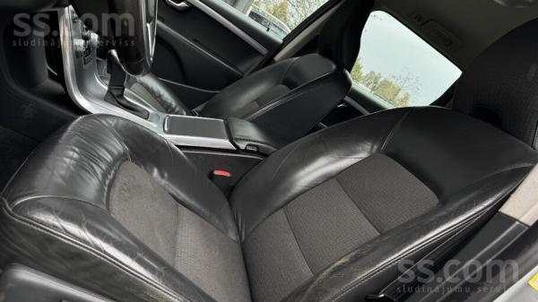 Grey Volvo V70 2016 in Riga, with an engine capacity of 2.00 L and mileage of 289 thousand km for 5990 €, photo 9 on AUTOMOTO.COM.LV