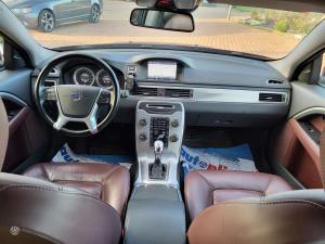 Sarkans Volvo V70 2013 Viļņa, ar dzinēja tilpumu 2.00 L un nobraukumu 298 tūkst. km par 5999 €, foto  vietnē AUTOMOTO.COM.LV