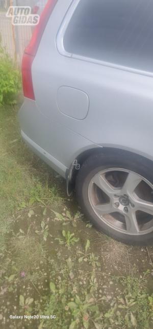 Volvo V70 2012 in Vilnius, with an engine capacity of 1.60 L and mileage of 390 thousand km for 1800 €, photo 14 on AUTOMOTO.COM.LV