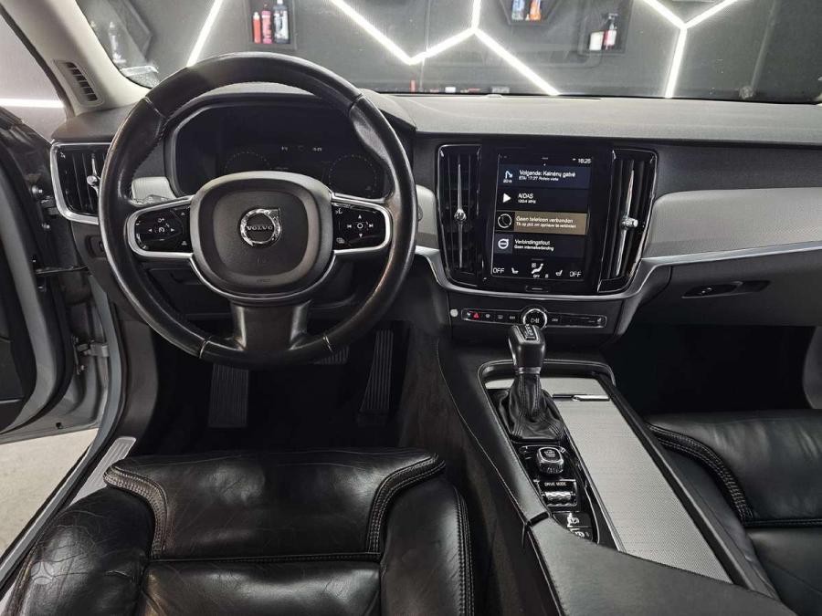 Grey Volvo V90 2017 in Mazeikiai, with an engine capacity of 2.00 L and mileage of 254 thousand km for 14950 €, photo 19 on AUTOMOTO.COM.LV