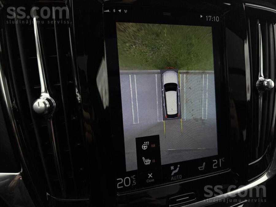 Grey Volvo V90 2018 in Riga, with an engine capacity of 2.00 L and mileage of 151 thousand km for 24750 €, photo 22 on AUTOMOTO.COM.LV