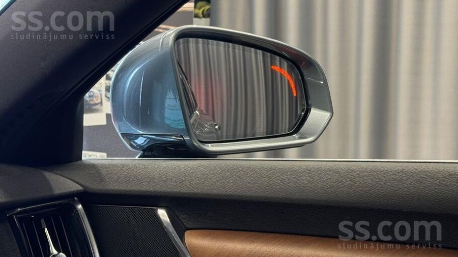 Grey Volvo V90 2018 in Riga, with an engine capacity of 2.00 L and mileage of 196 thousand km for 16990 €, photo 29 on AUTOMOTO.COM.LV