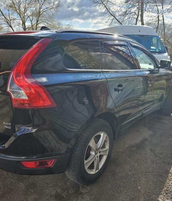Black Volvo XC60 2008 in Jonava, with an engine capacity of 2.40 L and mileage of 303 thousand km for 6700 €, photo 5 on AUTOMOTO.COM.LV