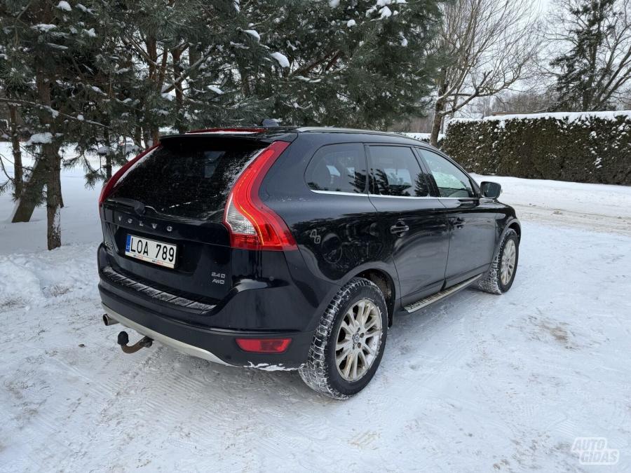 Black Volvo XC60 2009 in Ukmerge, with an engine capacity of 2.40 L and mileage of 286 thousand km for 6850 €, photo 4 on AUTOMOTO.COM.LV