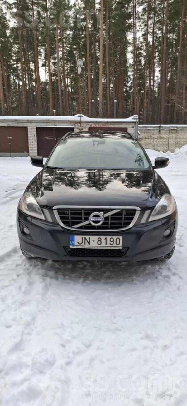 Black Volvo XC60 2009 in Riga, with an engine capacity of 2.40 L and mileage of 220 thousand km for 6500 €, photo 1 on AUTOMOTO.COM.LV