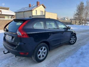 Melns Volvo XC60 2009 Viļņa, ar dzinēja tilpumu 2.40 L un nobraukumu 300 tūkst. km par 3990 €, foto  vietnē AUTOMOTO.COM.LV