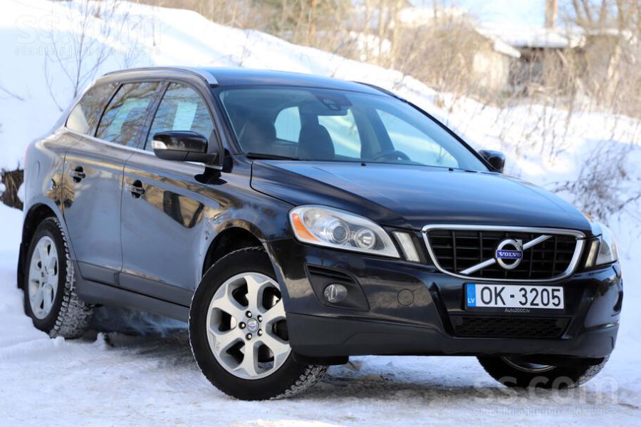 Black Volvo XC60 2009 in Tukums, with an engine capacity of 2.40 L and mileage of 386 thousand km for 7450 €, photo 1 on AUTOMOTO.COM.LV