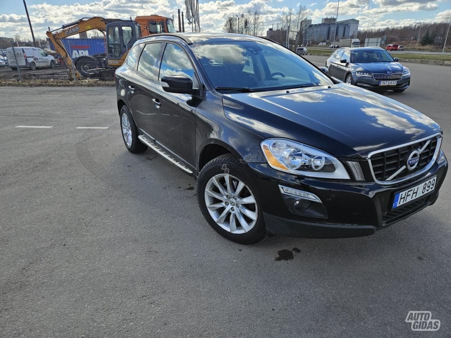 Black Volvo XC60 2009 in Panevezys, with an engine capacity of 2.40 L and mileage of 360 thousand km for 5300 €, photo 1 on AUTOMOTO.COM.LV
