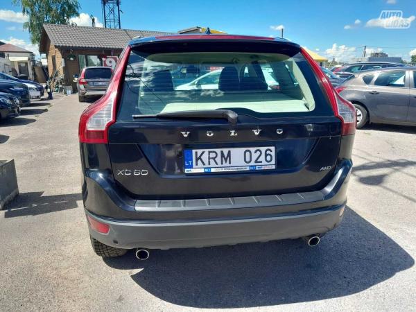 Black Volvo XC60 2009 in Kaunas, with an engine capacity of 2.40 L and mileage of 210 thousand km for 6999 €, photo 2 on AUTOMOTO.COM.LV