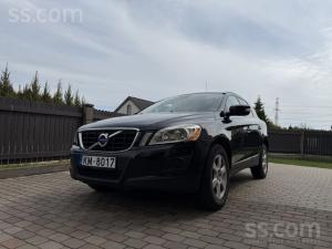 Melns Volvo XC60 2009 Rīga, ar dzinēja tilpumu 2.40 L un nobraukumu 265 tūkst. km par 6999 €, foto  vietnē AUTOMOTO.COM.LV