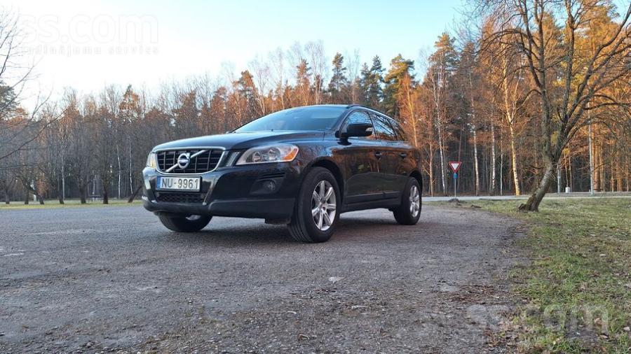 Black Volvo XC60 2009 in Riga, with an engine capacity of 2.40 L and mileage of 300 thousand km for 6500 €, photo 1 on AUTOMOTO.COM.LV