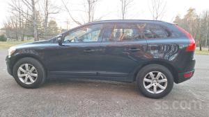 Black Volvo XC60 2009 in Riga, with an engine capacity of 2.40 L and mileage of 300 thousand km for 6500 €, photo 5 on AUTOMOTO.COM.LV