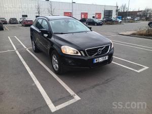 Black Volvo XC60 2009 in Riga, with an engine capacity of 2.40 L and mileage of 236 thousand km for 7400 €, photo 4 on AUTOMOTO.COM.LV
