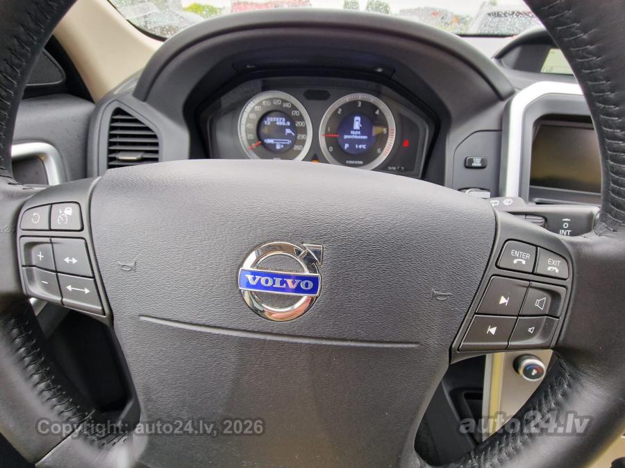 Black Volvo XC60 2009 in Tartu, with an engine capacity of 2.40 L and mileage of 227 thousand km for 8990 €, photo 13 on AUTOMOTO.COM.LV