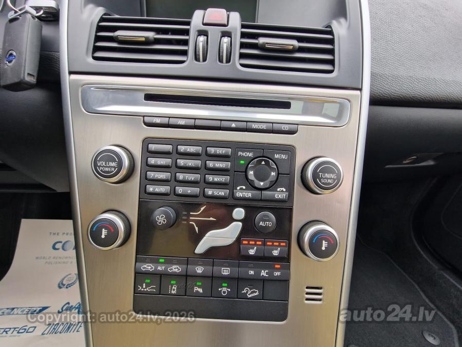 Black Volvo XC60 2009 in Tartu, with an engine capacity of 2.40 L and mileage of 227 thousand km for 8990 €, photo 15 on AUTOMOTO.COM.LV