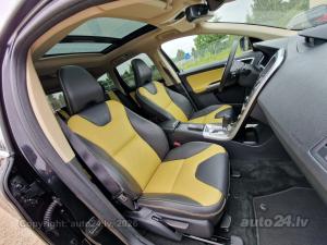 Black Volvo XC60 2009 in Tartu, with an engine capacity of 2.40 L and mileage of 227 thousand km for 8990 €, photo 18 on AUTOMOTO.COM.LV