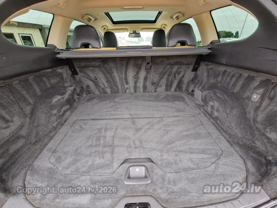 Black Volvo XC60 2009 in Tartu, with an engine capacity of 2.40 L and mileage of 227 thousand km for 8990 €, photo 21 on AUTOMOTO.COM.LV
