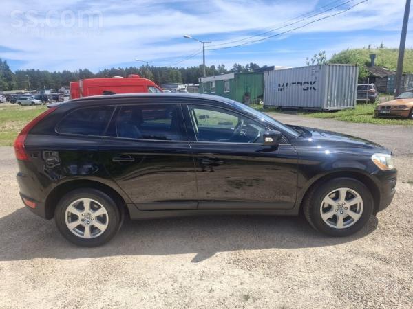 Black Volvo XC60 2009 in Riga, with an engine capacity of 2.40 L and mileage of 318 thousand km for 7780 €, photo 5 on AUTOMOTO.COM.LV
