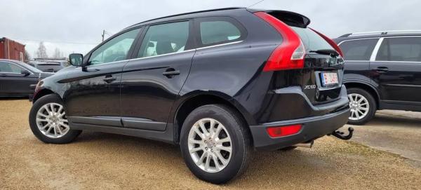 Black Volvo XC60 2009 in Riga, with an engine capacity of 2.40 L and mileage of 309 thousand km for 8990 €, photo 4 on AUTOMOTO.COM.LV