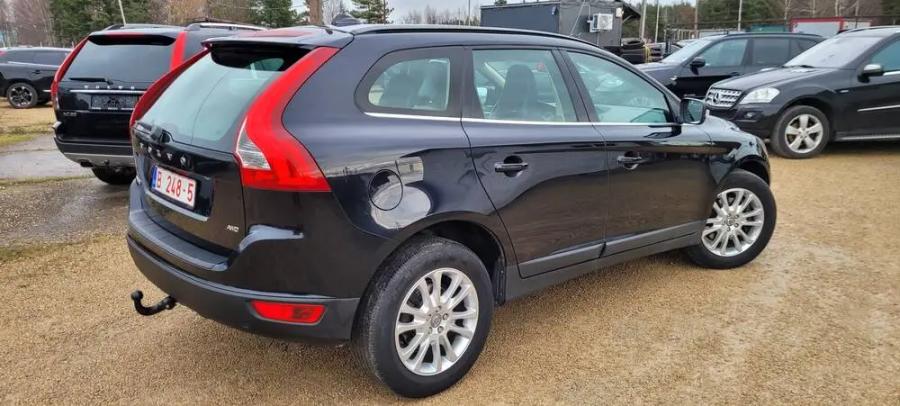 Black Volvo XC60 2009 in Riga, with an engine capacity of 2.40 L and mileage of 309 thousand km for 8990 €, photo 7 on AUTOMOTO.COM.LV