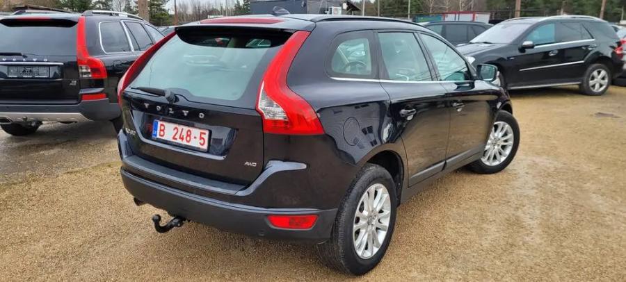 Black Volvo XC60 2009 in Riga, with an engine capacity of 2.40 L and mileage of 309 thousand km for 8990 €, photo 8 on AUTOMOTO.COM.LV
