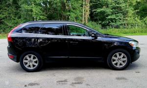 Black Volvo XC60 2009 in Ukmerge, with an engine capacity of 2.40 L and mileage of 402 thousand km for 6350 €, photo 3 on AUTOMOTO.COM.LV