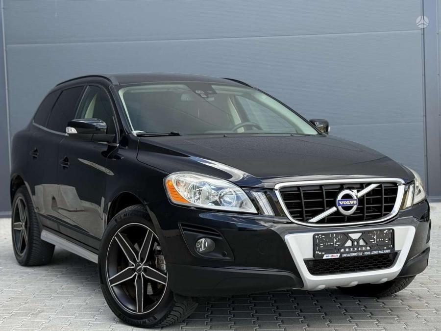Black Volvo XC60 2009 in Siauliai, with an engine capacity of 2.40 L and mileage of 300 thousand km for 8450 €, photo 1 on AUTOMOTO.COM.LV