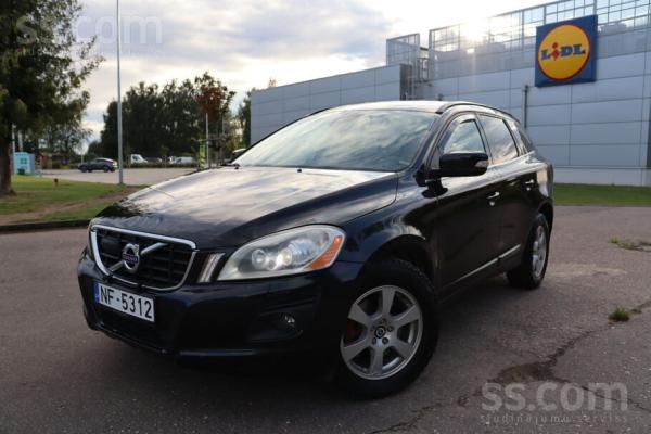 Black Volvo XC60 2009 in Riga, with an engine capacity of 2.40 L and mileage of 393 thousand km for 5990 €, photo 1 on AUTOMOTO.COM.LV