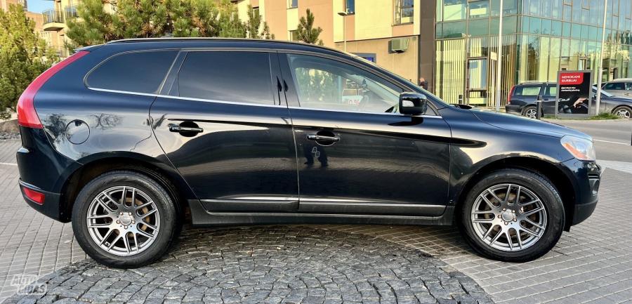 Black Volvo XC60 2009 in Vilnius, with an engine capacity of 2.40 L and mileage of 369 thousand km for 6450 €, photo 5 on AUTOMOTO.COM.LV