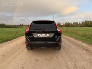 Black Volvo XC60 2010 in Riga, with an engine capacity of 2.40 L and mileage of 300 thousand km for 7400 €, photo 4 on AUTOMOTO.COM.LV