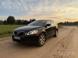 Black Volvo XC60 2010 in Riga, with an engine capacity of 2.40 L and mileage of 300 thousand km for 7400 €, photo 6 on AUTOMOTO.COM.LV
