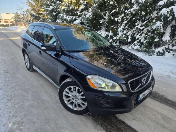 Black Volvo XC60 2010 in Vilnius, with an engine capacity of 2.40 L and mileage of 300 thousand km for 5950 €, photo 1 on AUTOMOTO.COM.LV