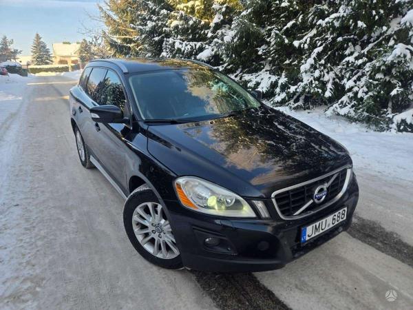 Black Volvo XC60 2010 in Vilnius, with an engine capacity of 2.40 L and mileage of 300 thousand km for 5950 €, photo 2 on AUTOMOTO.COM.LV