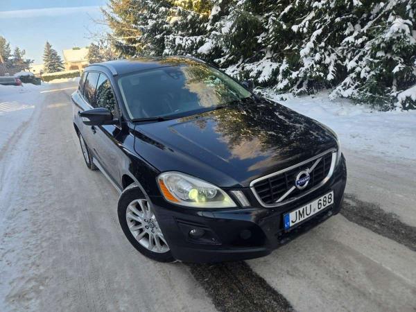 Black Volvo XC60 2010 in Vilnius, with an engine capacity of 2.40 L and mileage of 300 thousand km for 5950 €, photo 4 on AUTOMOTO.COM.LV