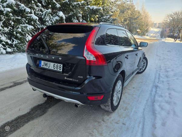 Black Volvo XC60 2010 in Vilnius, with an engine capacity of 2.40 L and mileage of 300 thousand km for 5950 €, photo 6 on AUTOMOTO.COM.LV