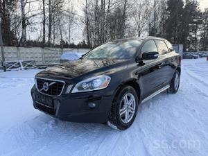 Black Volvo XC60 2010 in Riga, with an engine capacity of 2.40 L and mileage of 263 thousand km for 7480 €, photo  on AUTOMOTO.COM.LV