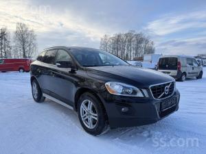 Black Volvo XC60 2010 in Riga, with an engine capacity of 2.40 L and mileage of 263 thousand km for 7480 €, photo 2 on AUTOMOTO.COM.LV