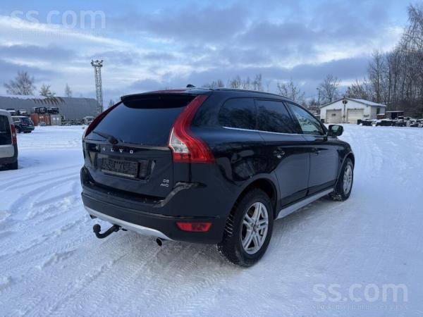 Black Volvo XC60 2010 in Riga, with an engine capacity of 2.40 L and mileage of 263 thousand km for 7480 €, photo 4 on AUTOMOTO.COM.LV