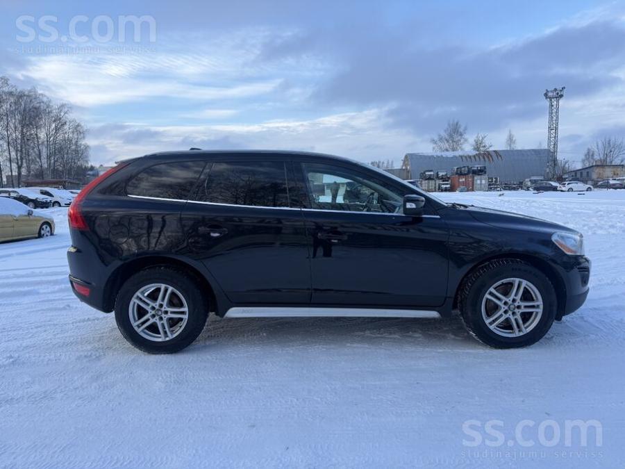 Black Volvo XC60 2010 in Riga, with an engine capacity of 2.40 L and mileage of 263 thousand km for 7480 €, photo 7 on AUTOMOTO.COM.LV