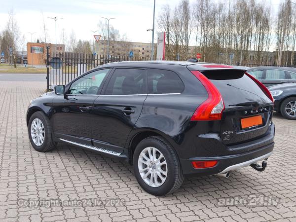 Black Volvo XC60 2010 in Tartu, with an engine capacity of 2.40 L and mileage of 264 thousand km for 9490 €, photo 4 on AUTOMOTO.COM.LV