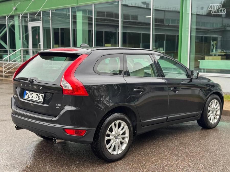 Black Volvo XC60 2010 in Vilnius, with an engine capacity of 2.40 L and mileage of 302 thousand km for 5700 €, photo 5 on AUTOMOTO.COM.LV