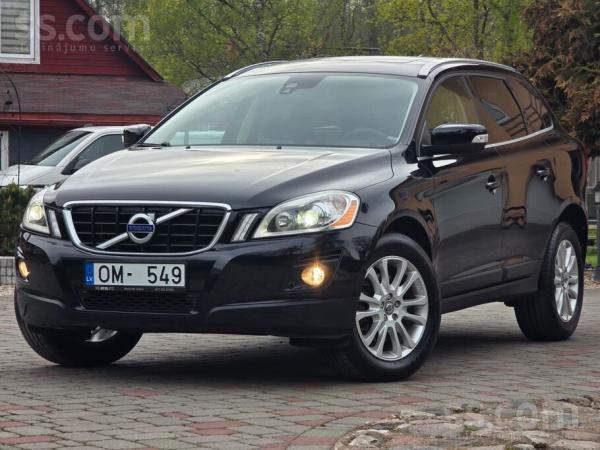 Black Volvo XC60 2010 in Riga, with an engine capacity of 2.40 L and mileage of 329 thousand km for 8350 €, photo 1 on AUTOMOTO.COM.LV