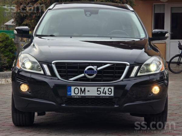 Black Volvo XC60 2010 in Riga, with an engine capacity of 2.40 L and mileage of 329 thousand km for 8350 €, photo 8 on AUTOMOTO.COM.LV