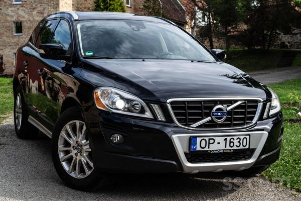 Black Volvo XC60 2010 in Tukums, with an engine capacity of 2.40 L and mileage of 270 thousand km for 8290 €, photo 1 on AUTOMOTO.COM.LV